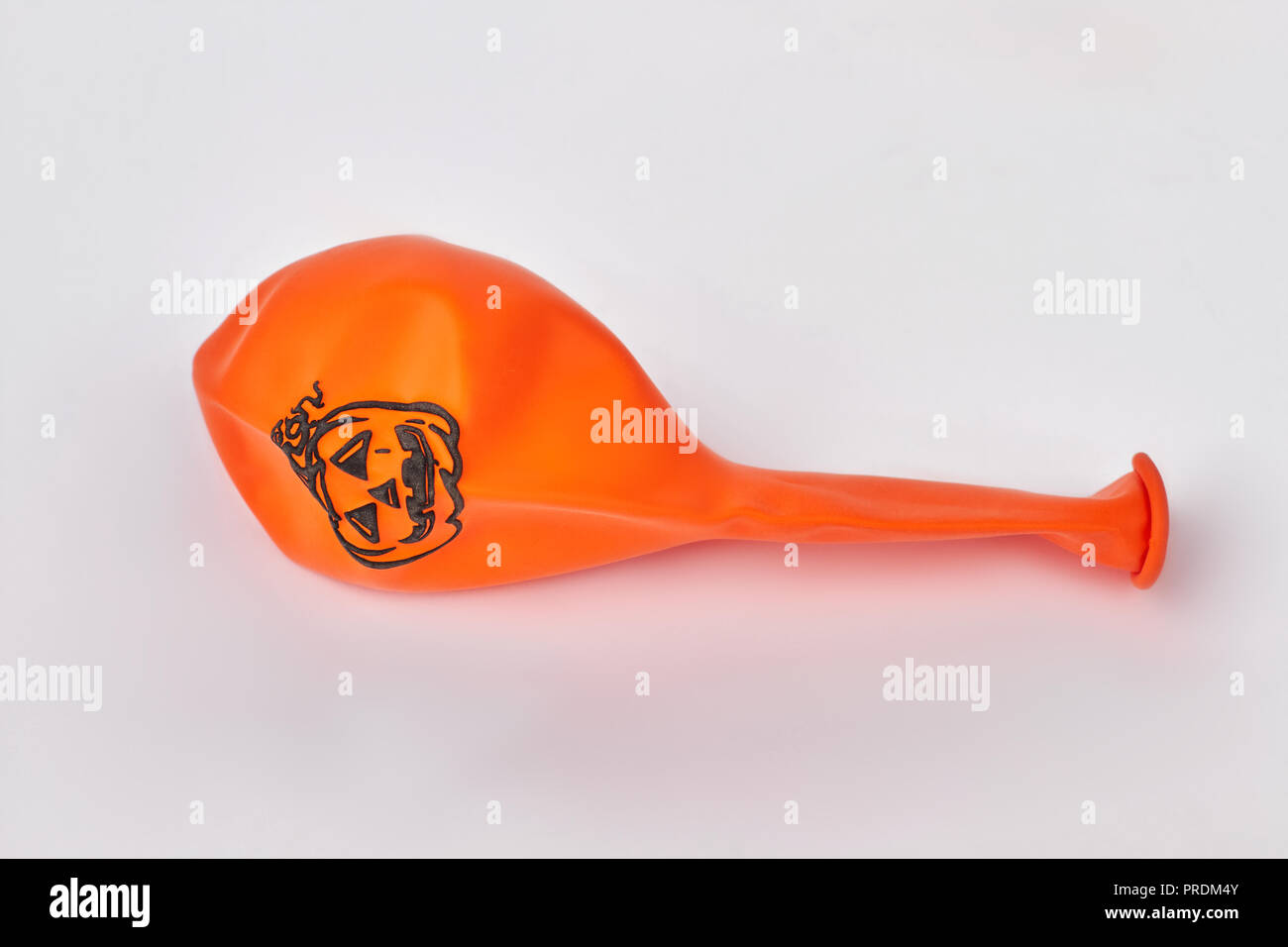 Orange balloon for Halloween Stock Photo - Alamy