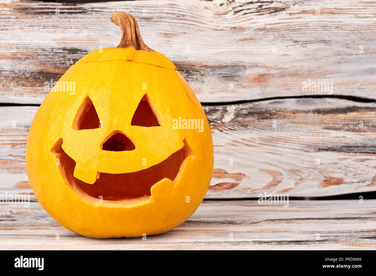 Pumpkin Jack-O-Lantern with happy face Stock Photo - Alamy