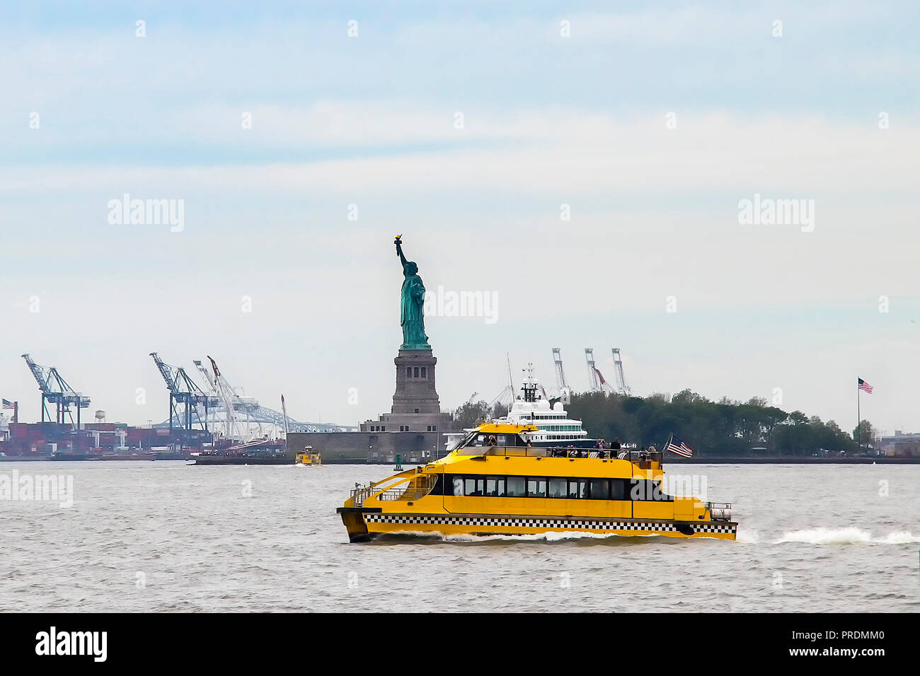 Yellow catamaran in Manhattan bay Stock Photo - Alamy