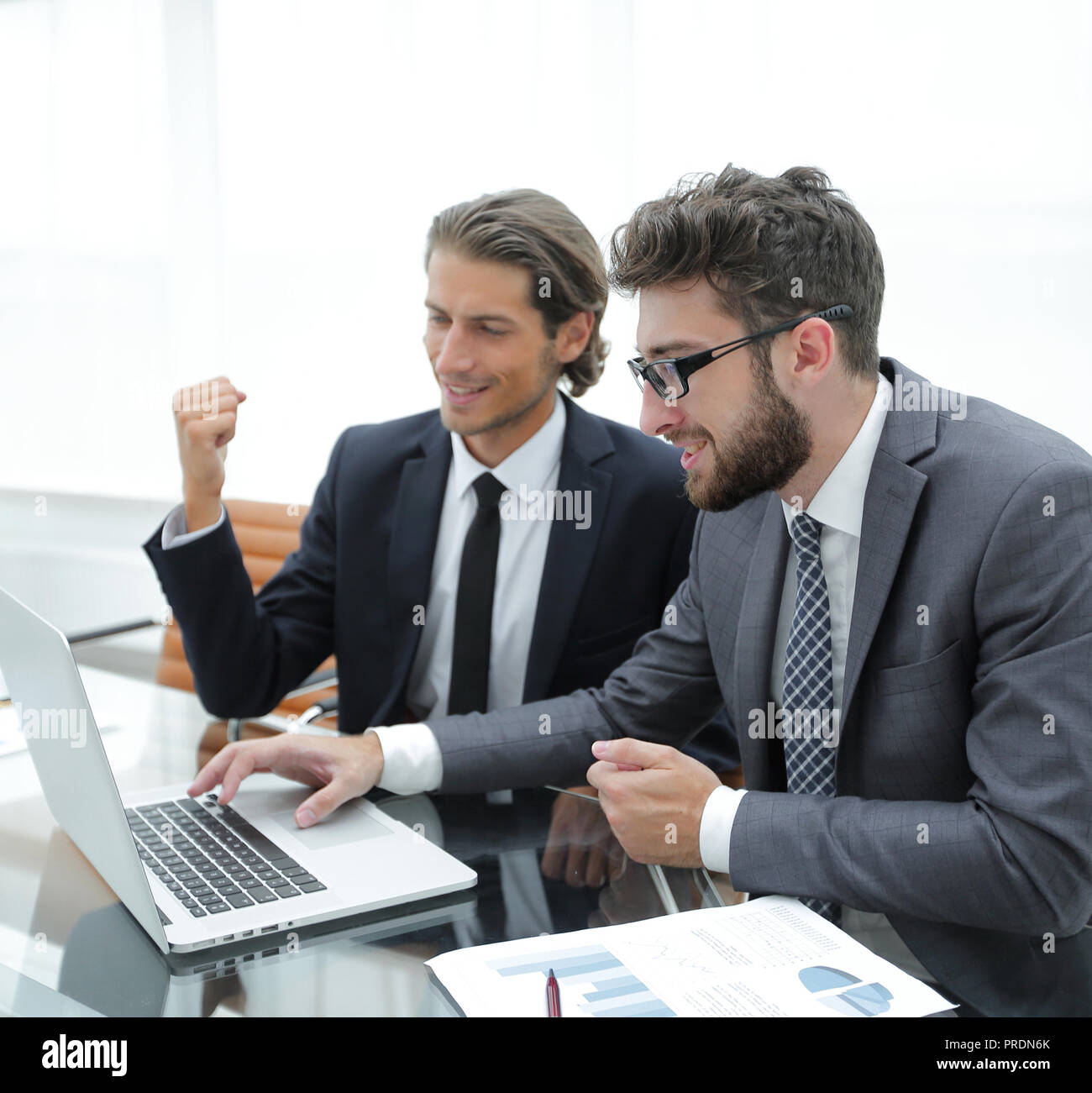 two business people working on laptop Stock Photo - Alamy