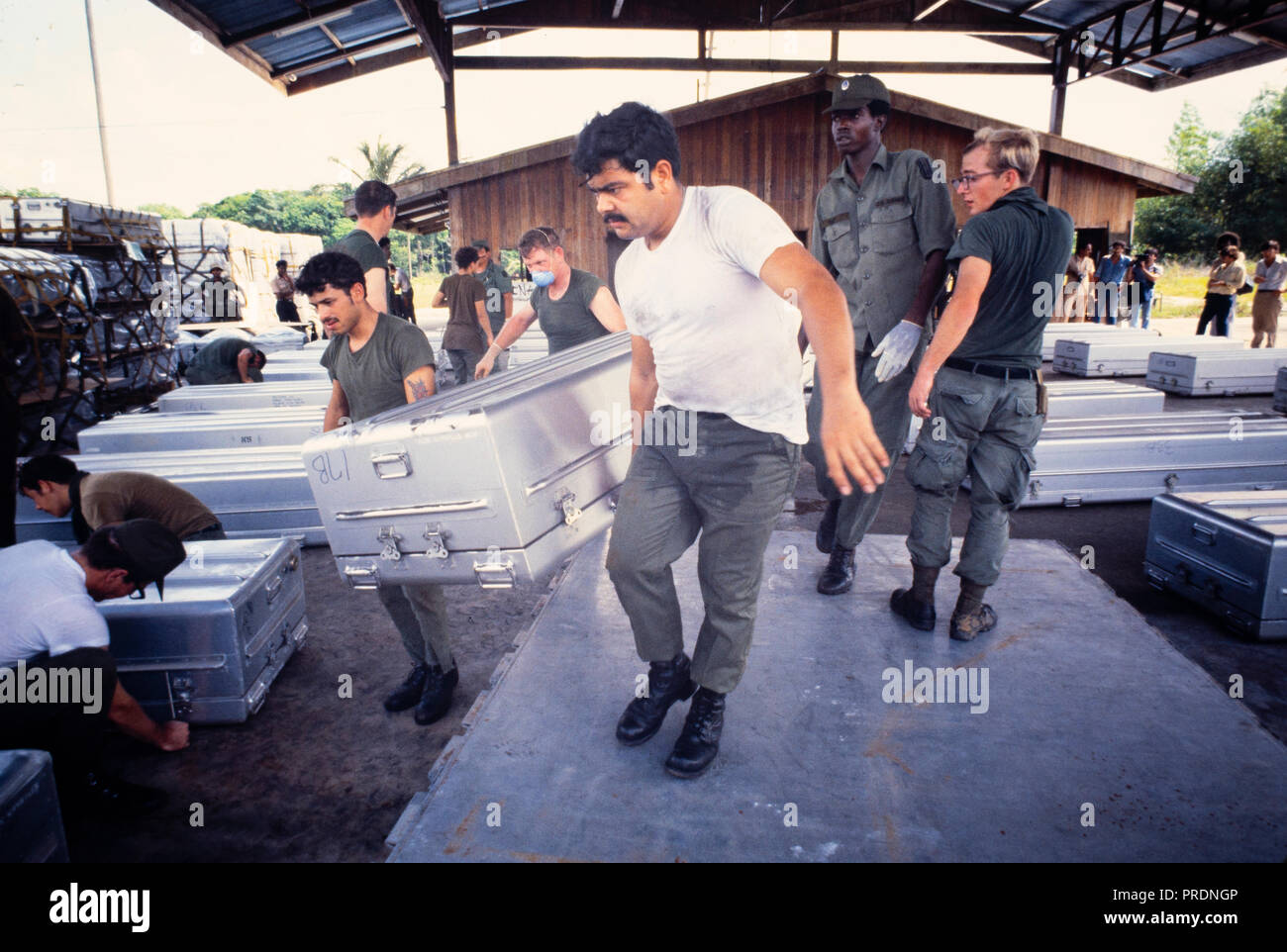 United States military personnel remove American bodies from the cult ...