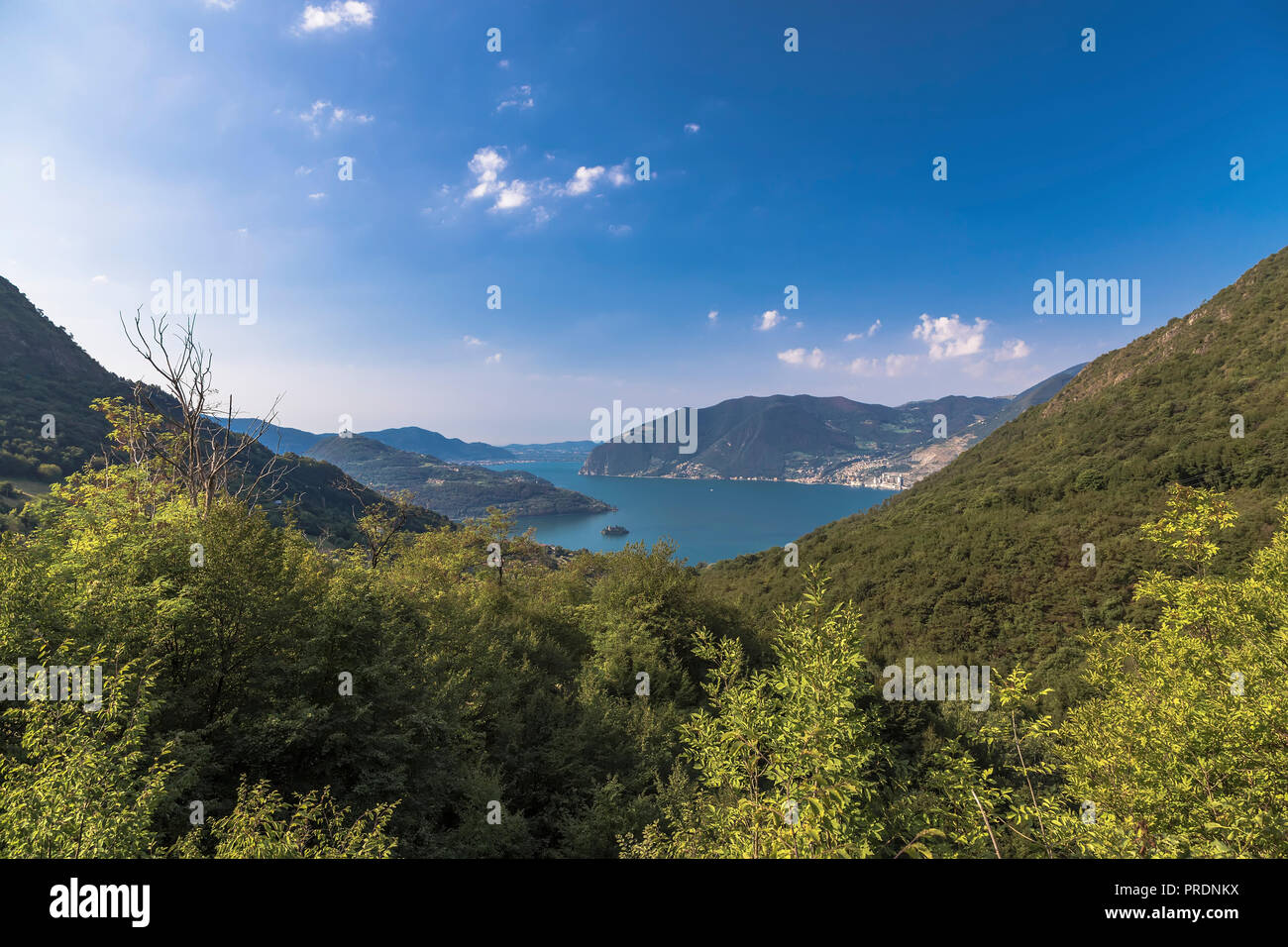 The mountains of Lombardy, Lake Iseo and a small island in it. Italy ...
