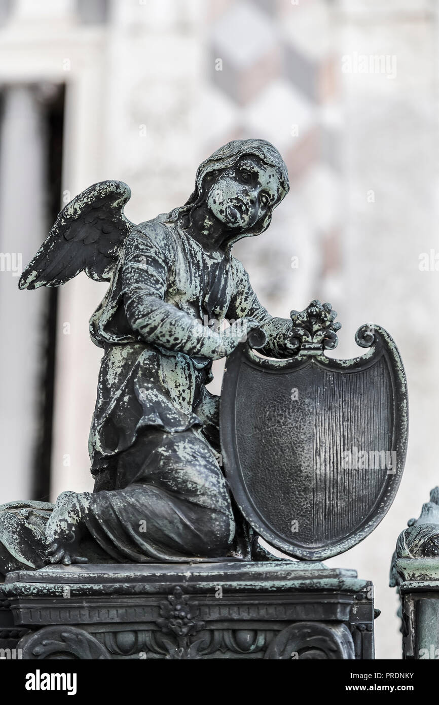 Shield angel hi-res stock photography and images - Alamy