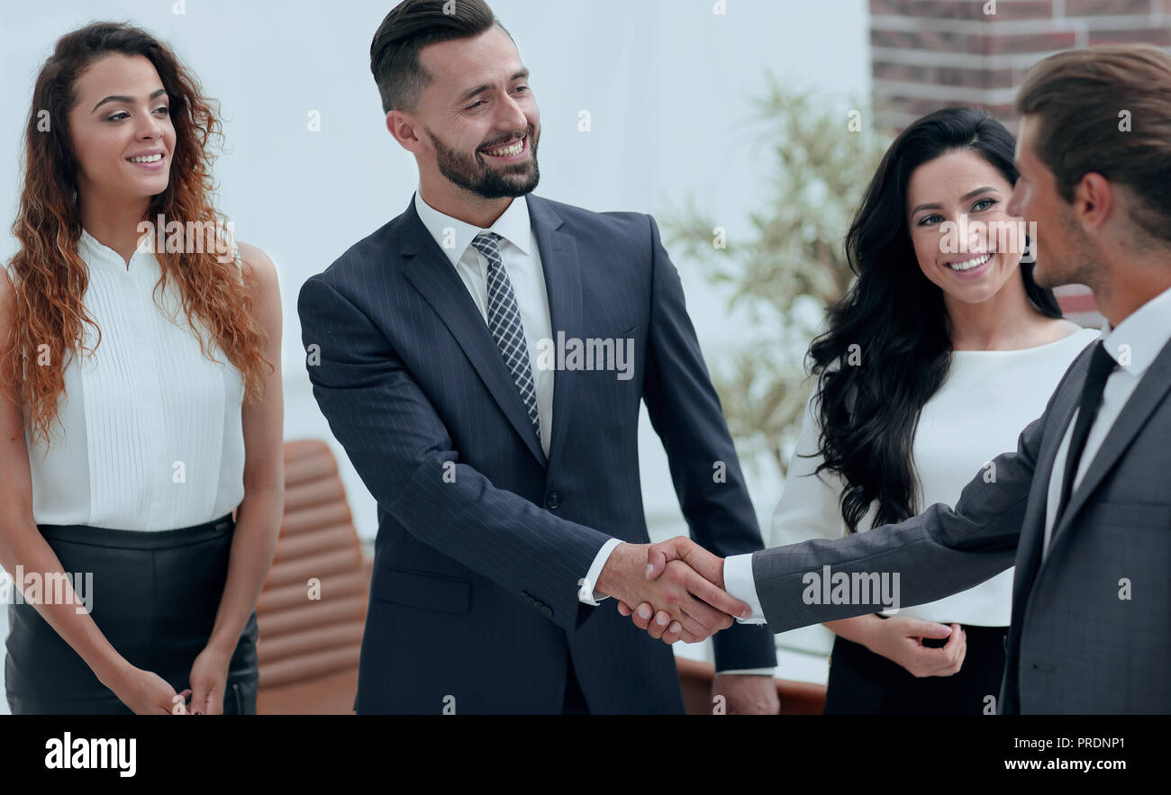 handshake business partners in the office Stock Photo - Alamy