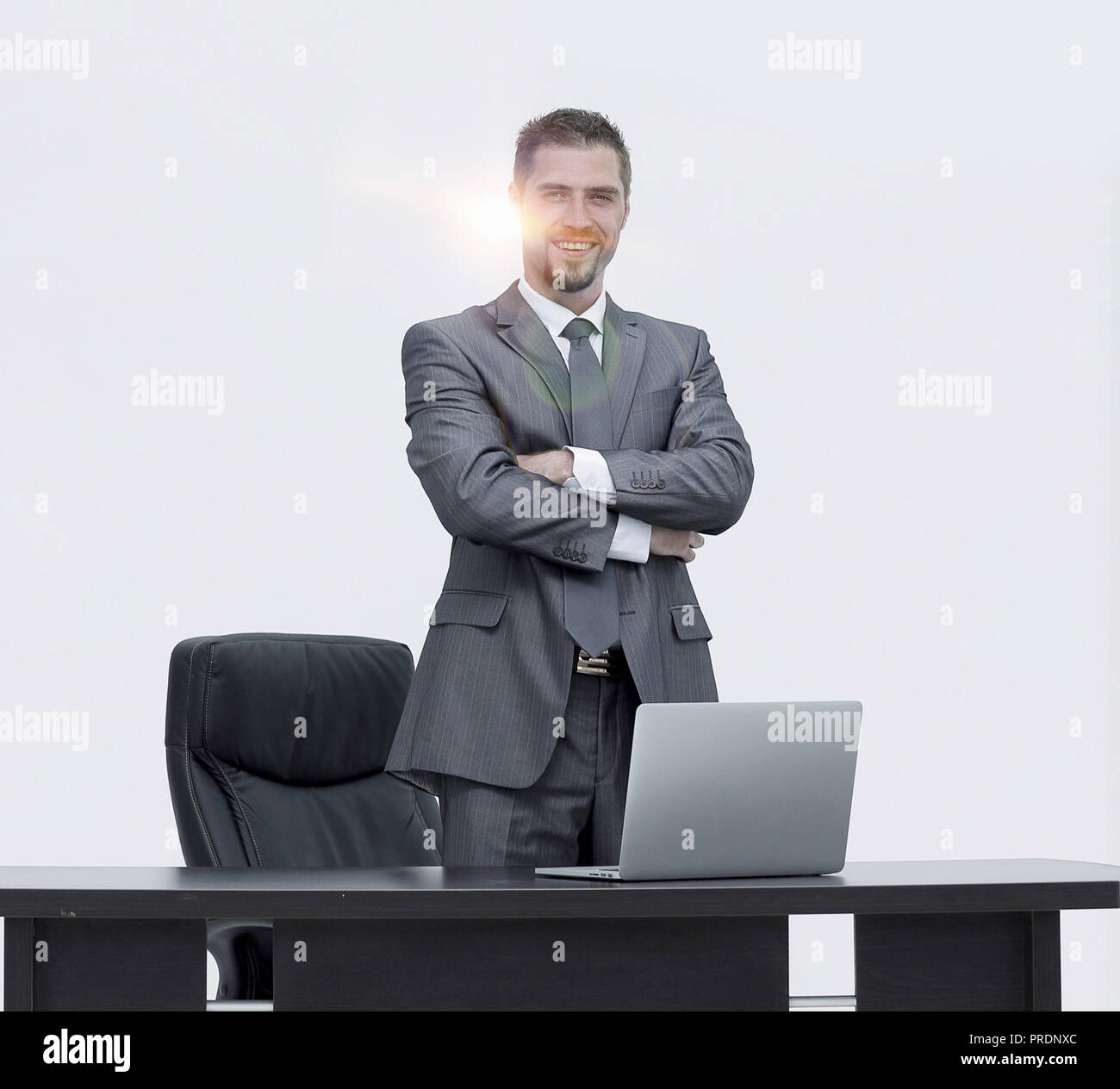 closeup.a successful leader, standing behind a Desk . isolated on white ...