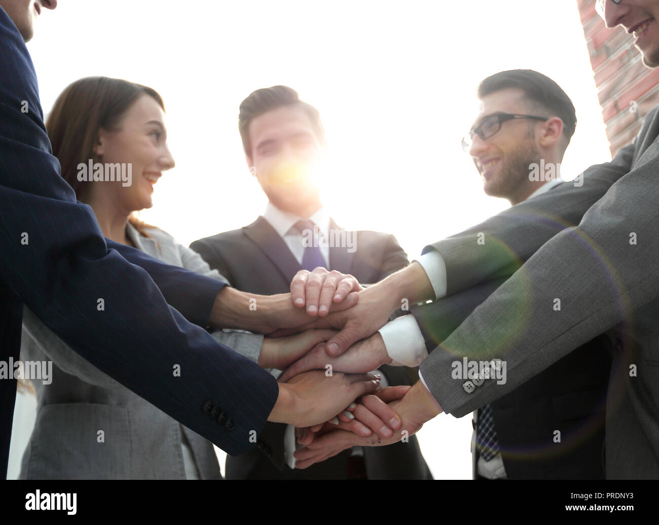 business people teamwork stacking hand together concept Stock Photo - Alamy