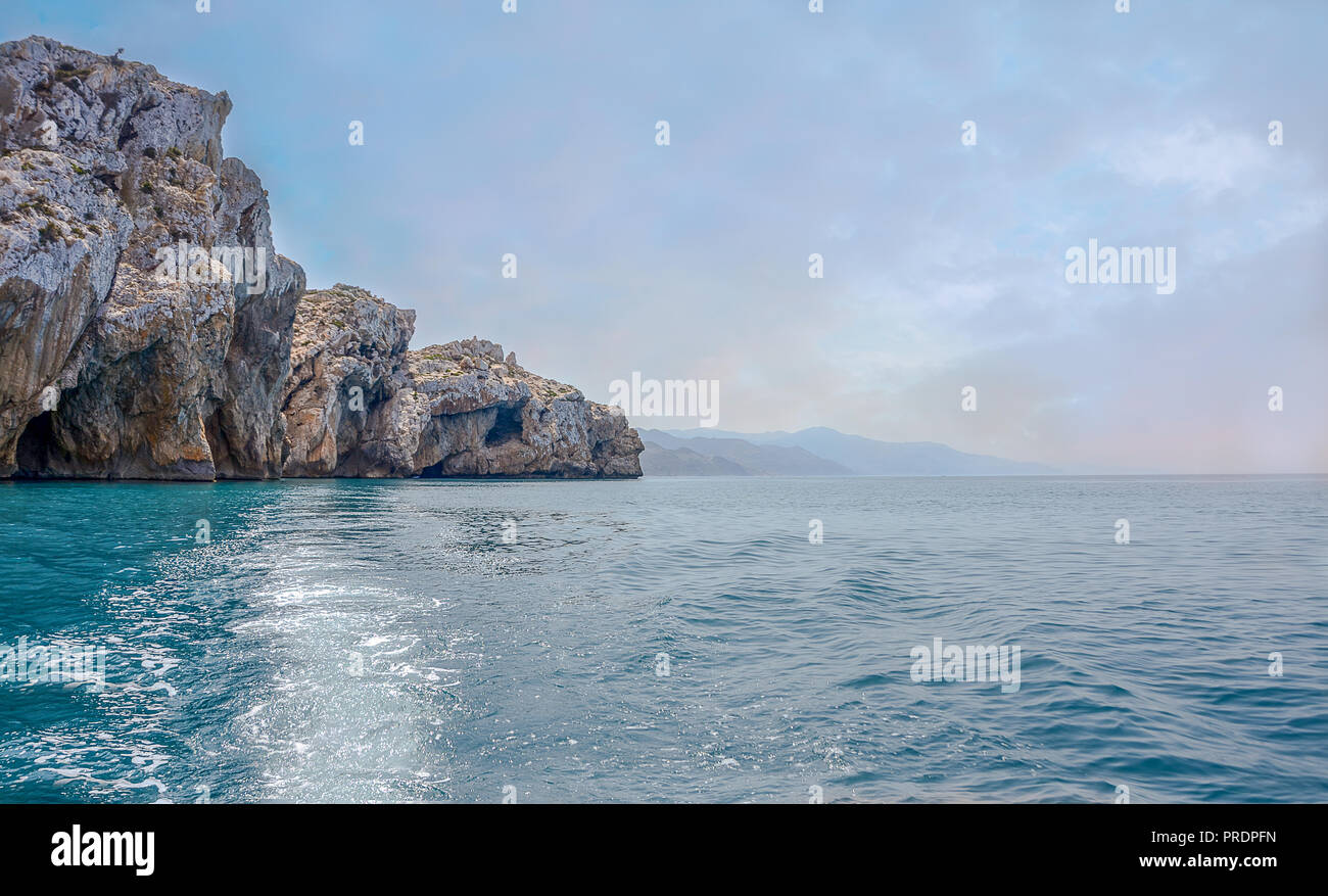Rocks, sea and blue sky - El Jebha Morocco Stock Photo - Alamy