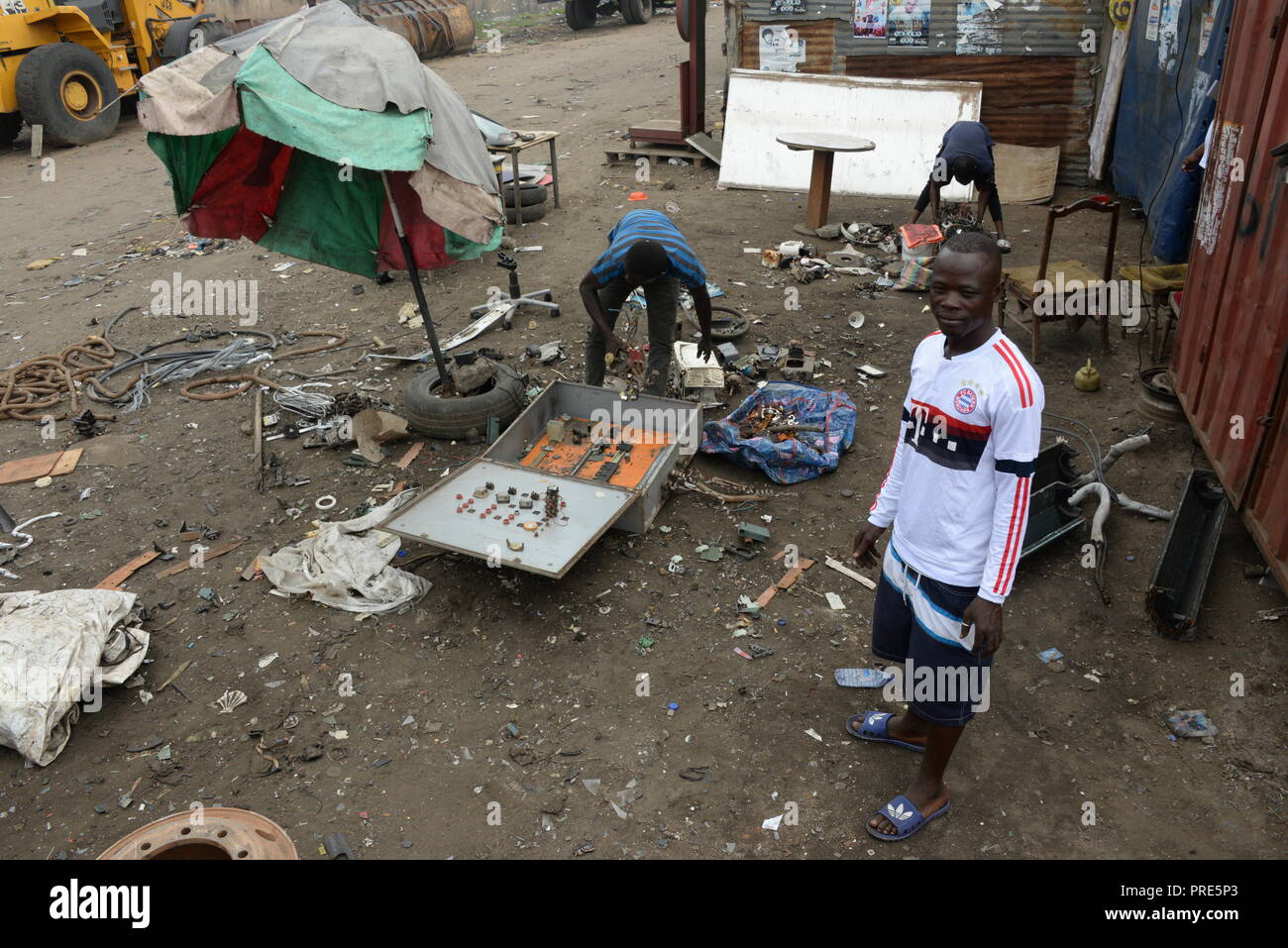 Accra, Ghana. 09th June, 2018. The recycler Lubman Idris (front r ...