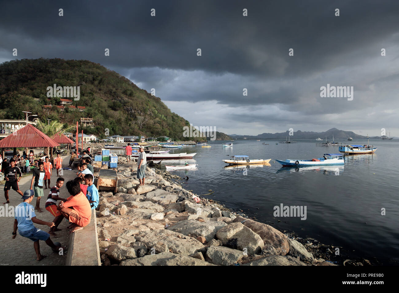 People on waterfront in Labuan Bajo, Flores, Indonesia, Southeast Asia ...