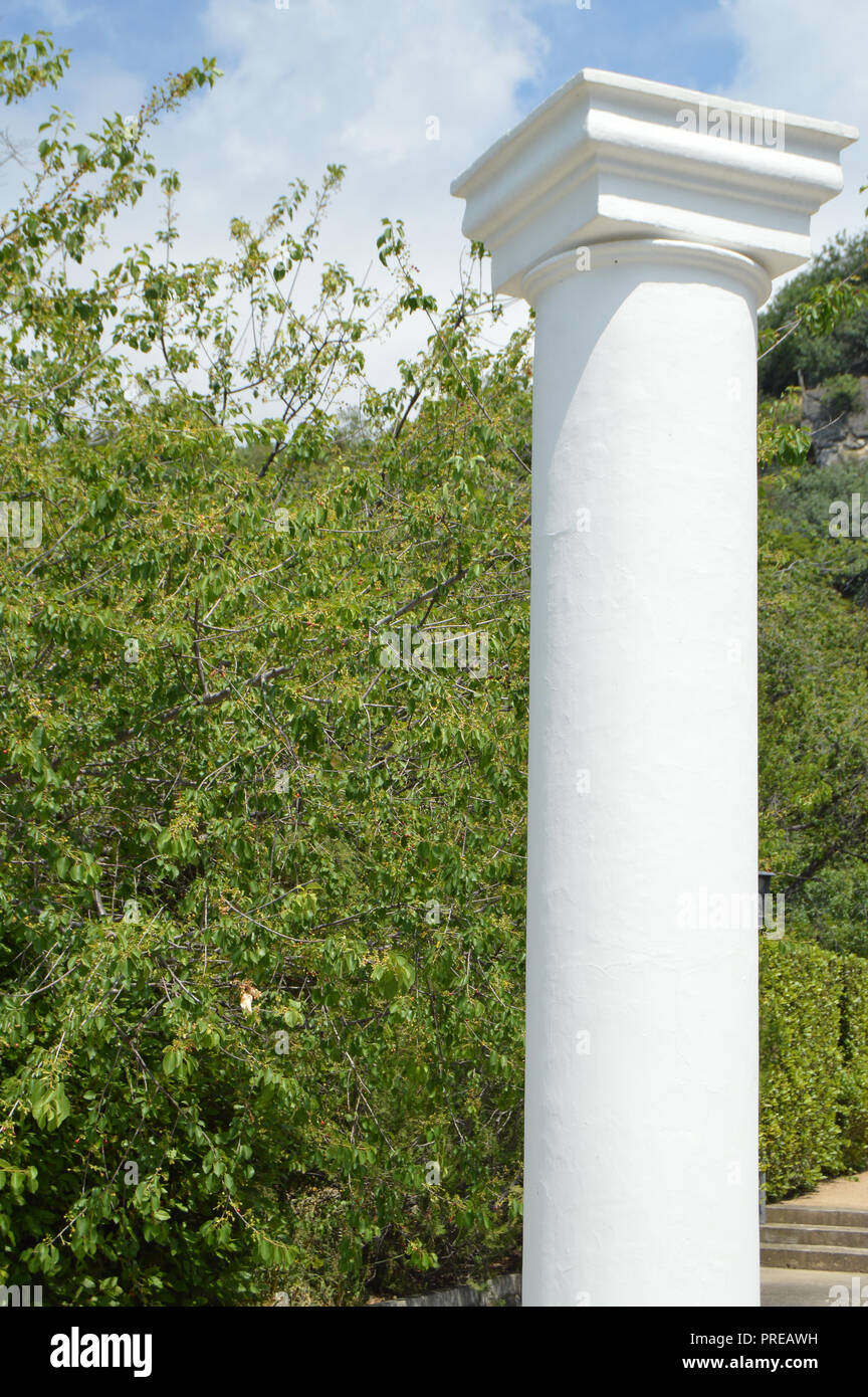 White decorative columns in Greek style to decorate the Park Stock ...