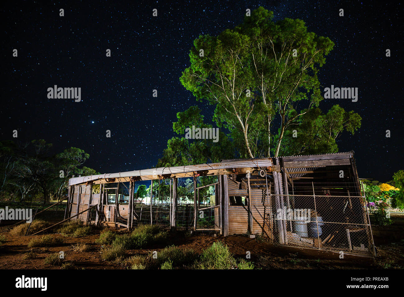 Abandoned shearing shed under starry night sky at Fraser Range Station ...