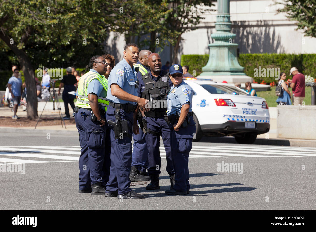 Police officers together at an outdoor event - Washington, DC USA Stock ...