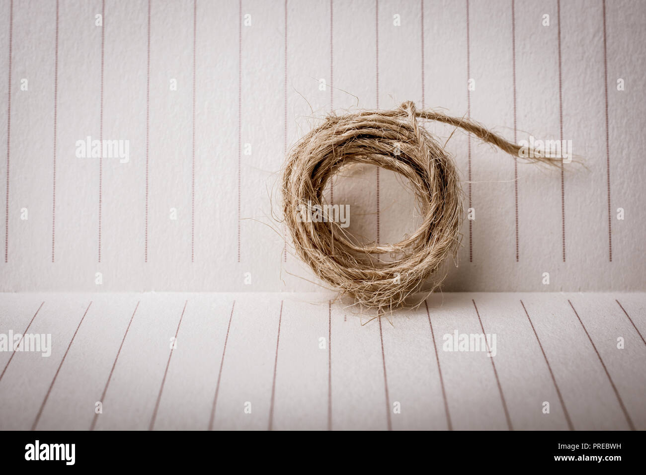 Roll of brown color linen string paper background Stock Photo - Alamy