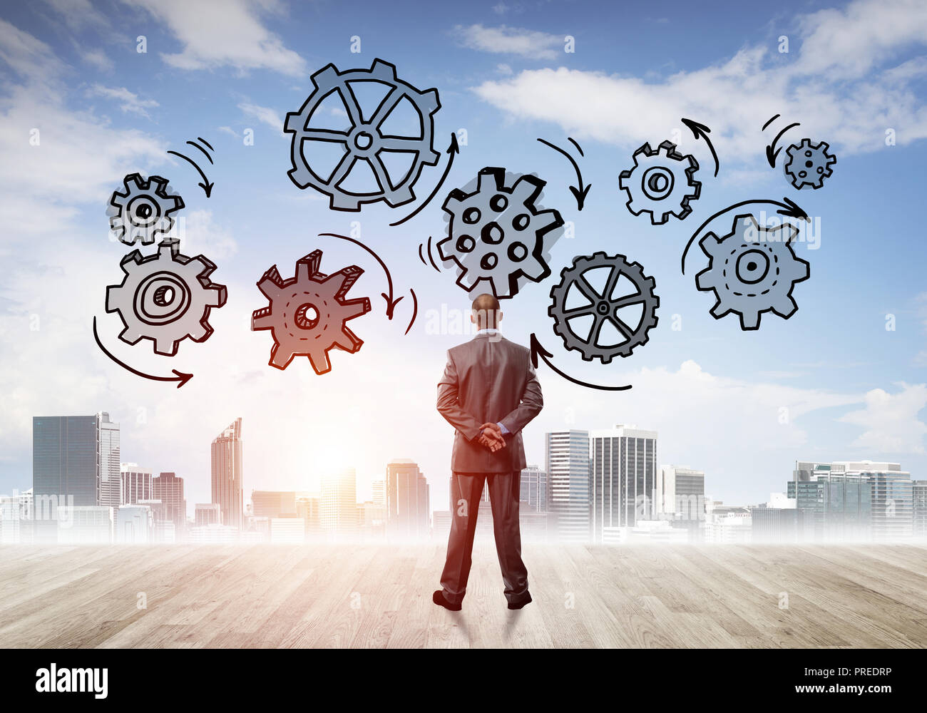 Cogwheel engine drawn on screen as symbol for teamwork and cooperation ...