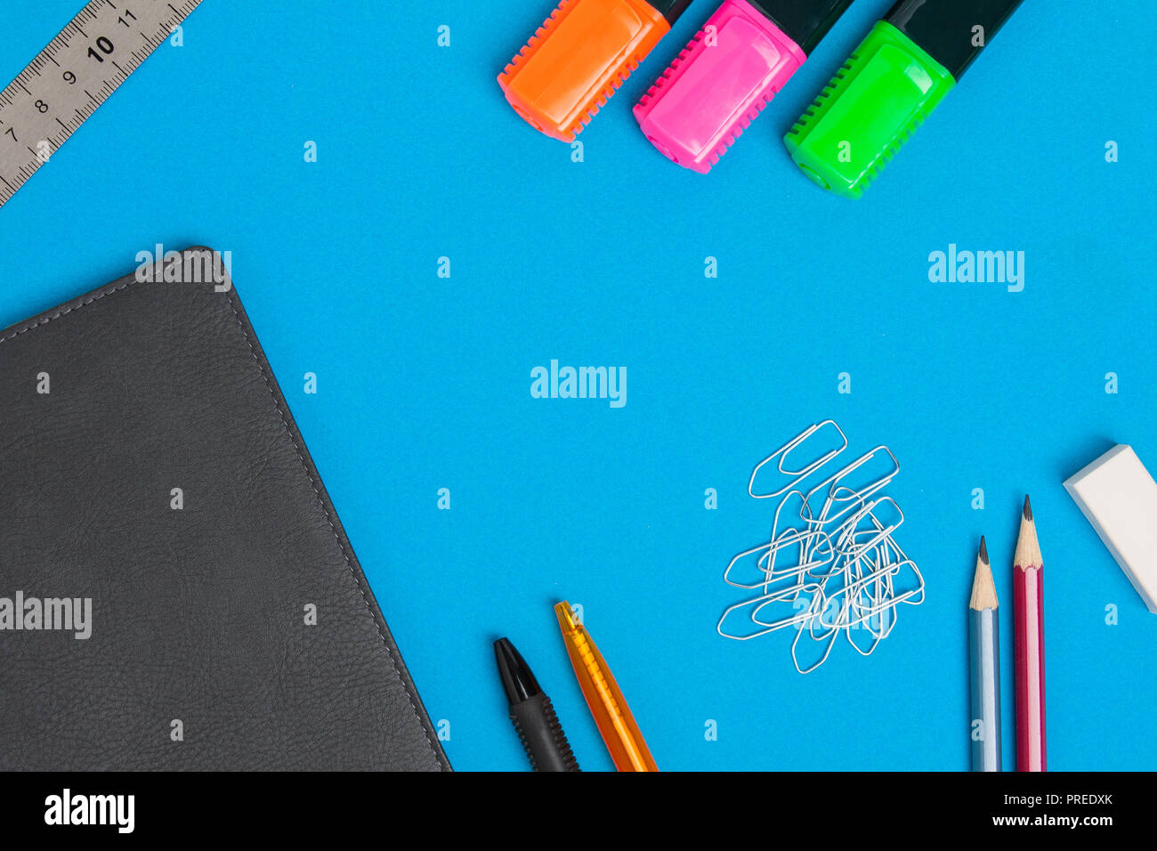 Two pen, two pencil, one ruler, paperclips, one erase,three markers and ...