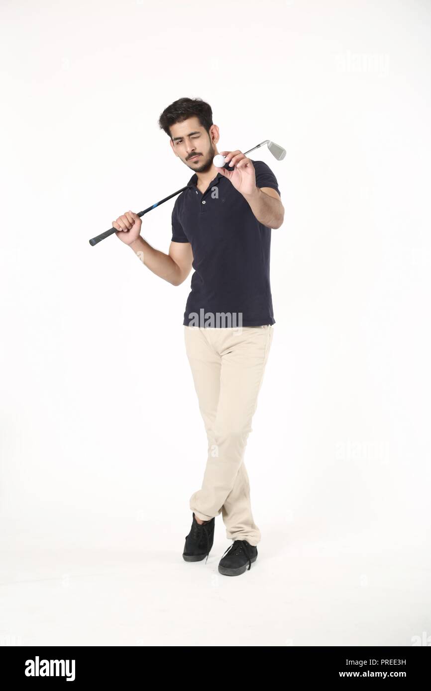 Picture of boy with golf stick and golf ball. Isolated on white ...