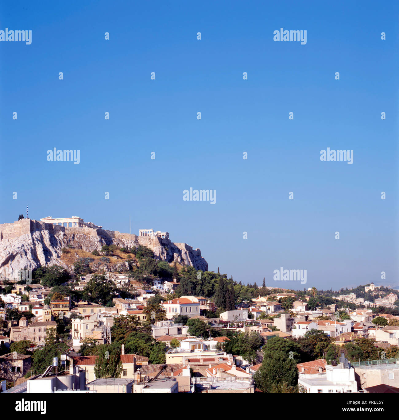 Skyline of Athens with Acropolis hill with clear blue sky Stock Photo ...