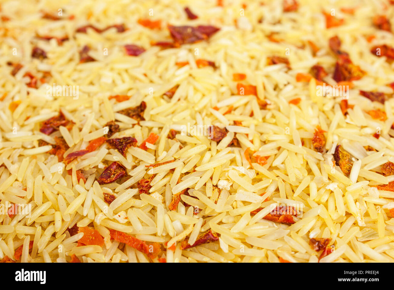 Background texture of basmati rice with dried vegetables Stock Photo ...
