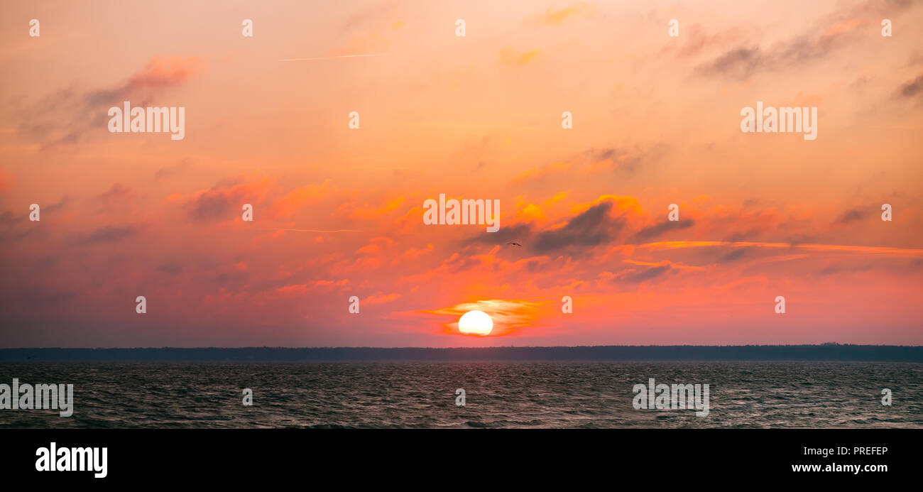 Sunrise Above Baltic Sea. Natural Sunrise Sky Warm Colors Over Ripple ...