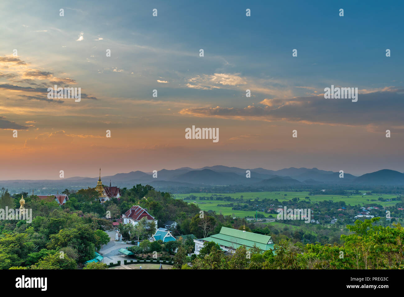 Wat Phrathat Doi Saket with the sunset sky and clouds in the background ...