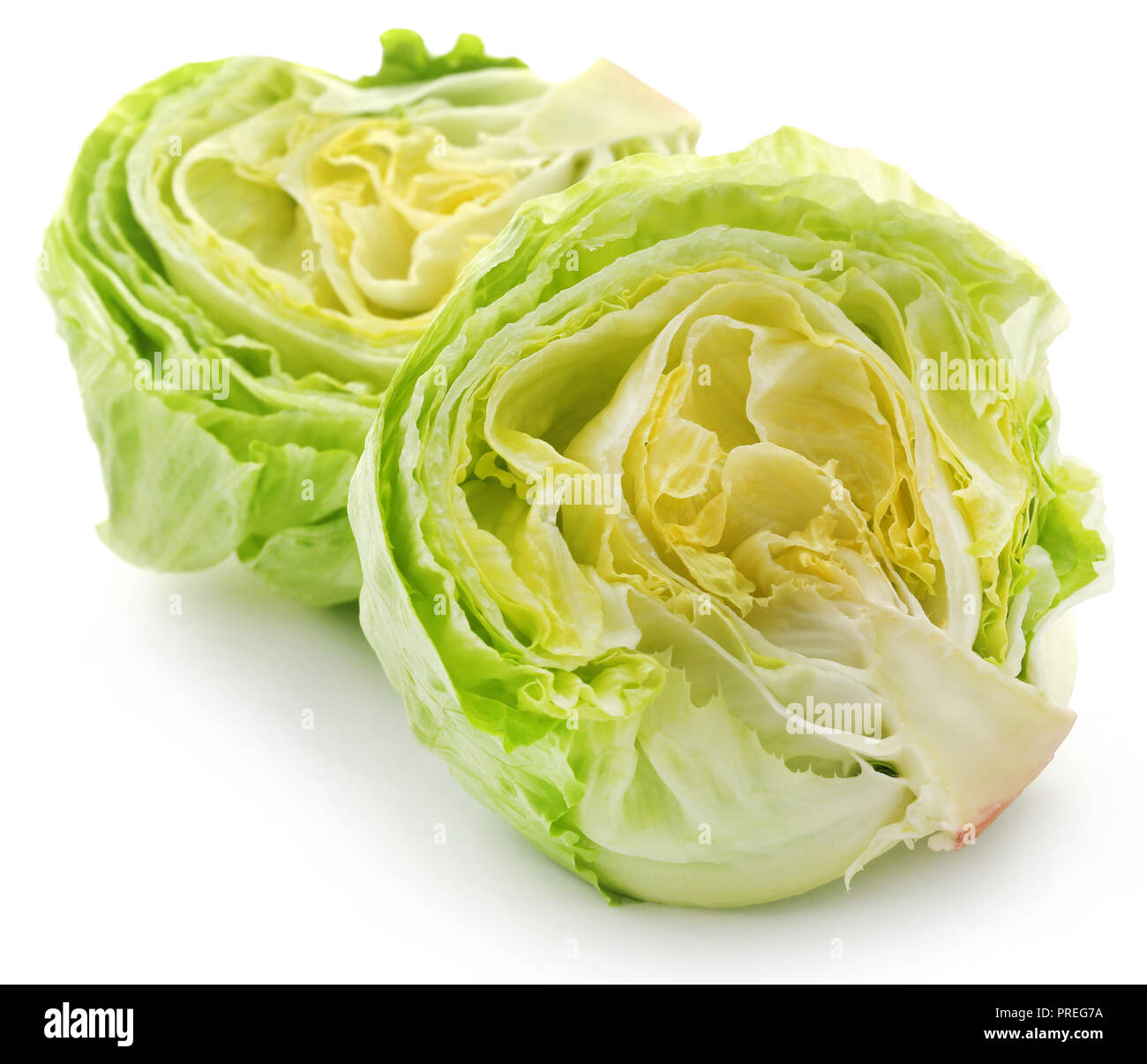 Iceberg lettuce fresh and sliced over white background Stock Photo - Alamy
