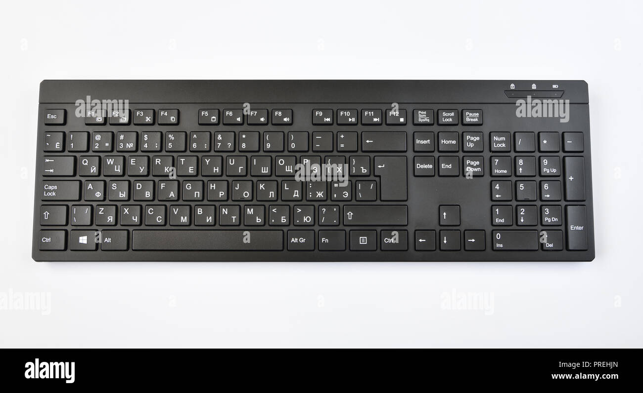black wireless keyboard on a white background Stock Photo - Alamy