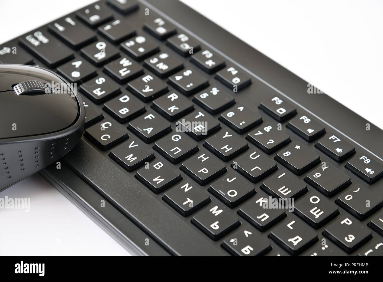 black wireless keyboard on a white background Stock Photo - Alamy