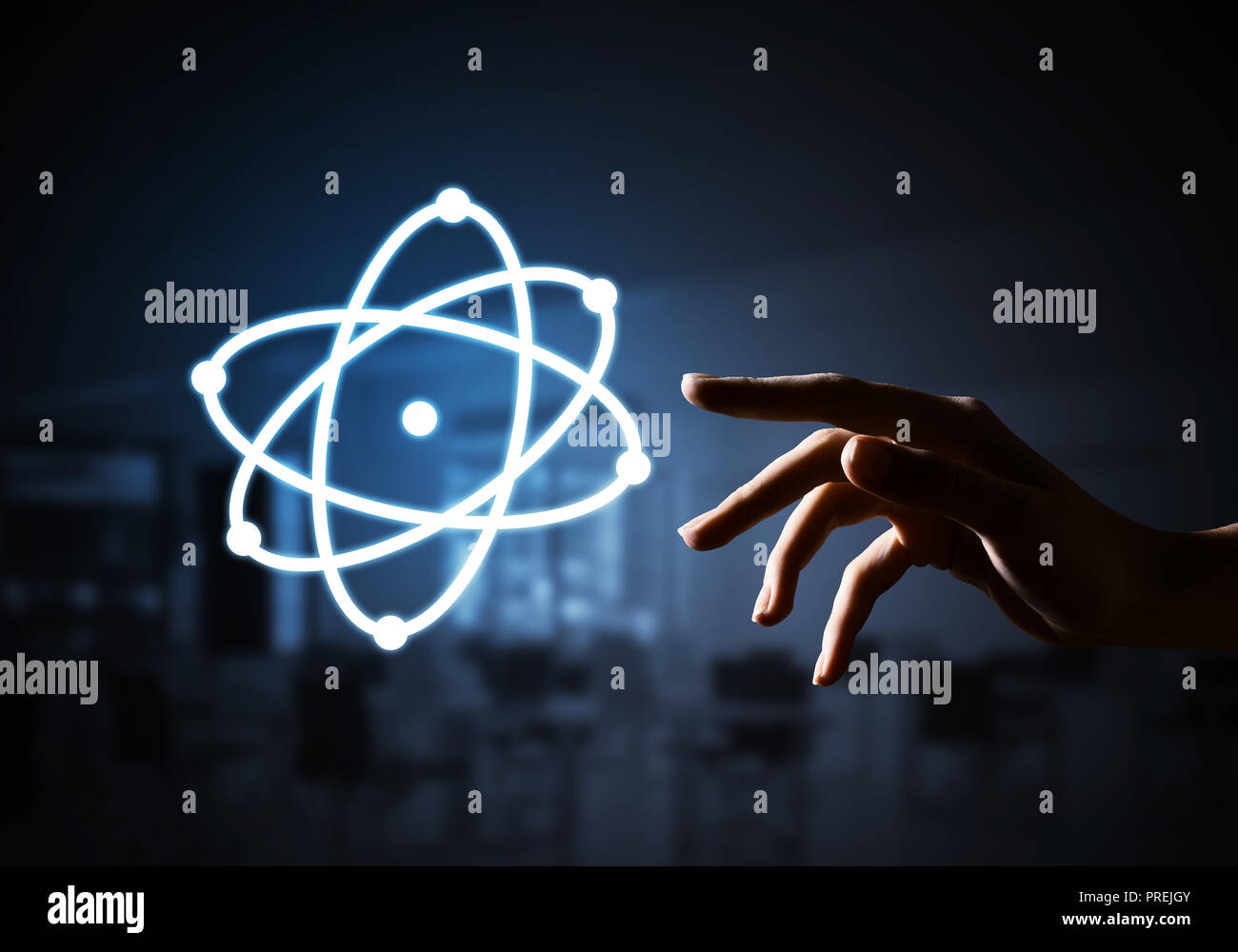 Science concept presented by atom symbol on dark interior background ...