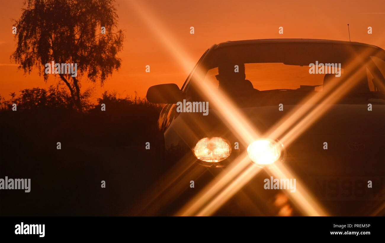 Car at night headlight glare hi-res stock photography and images - Alamy
