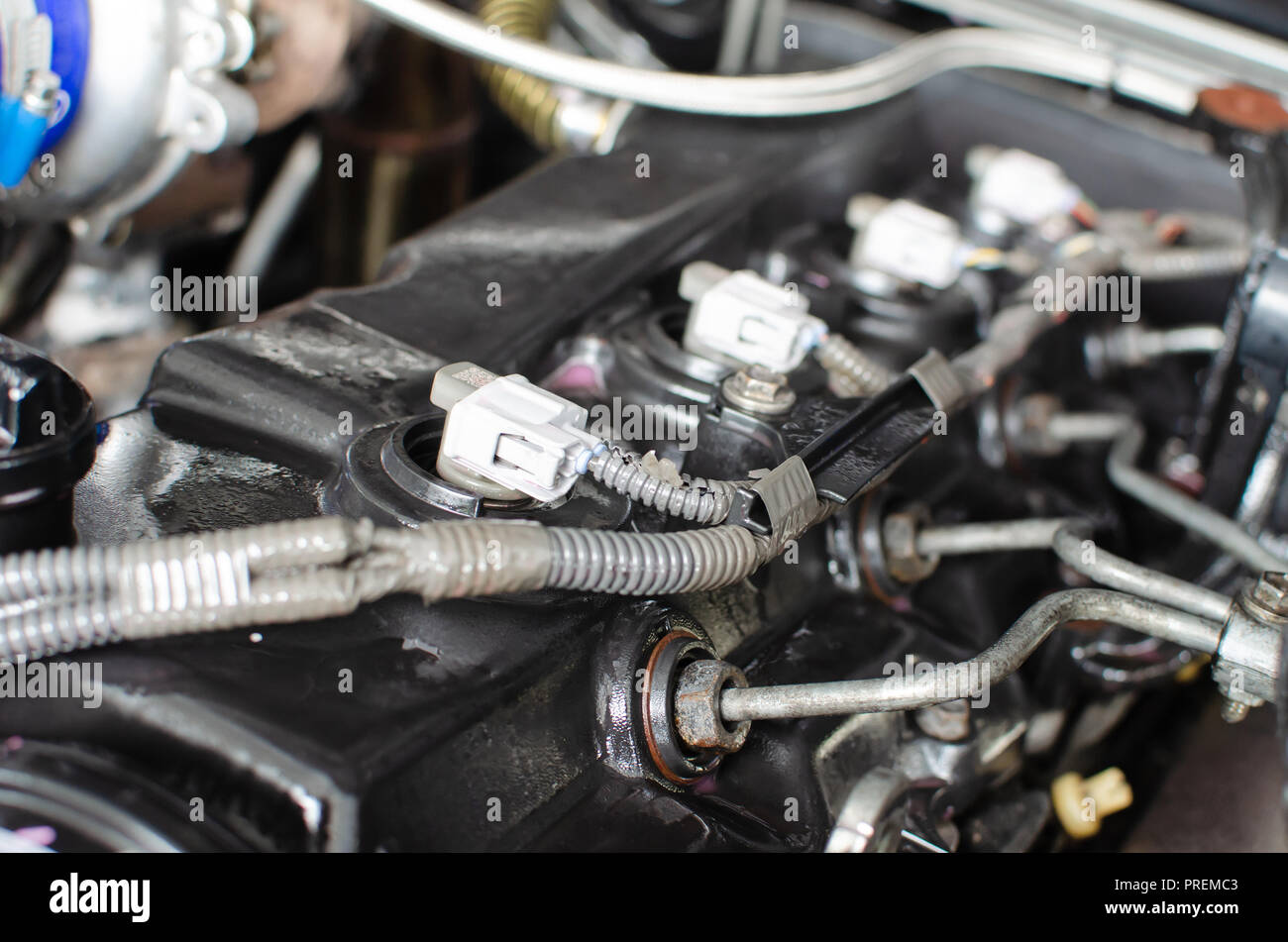 Close up shot of car engine details Stock Photo - Alamy