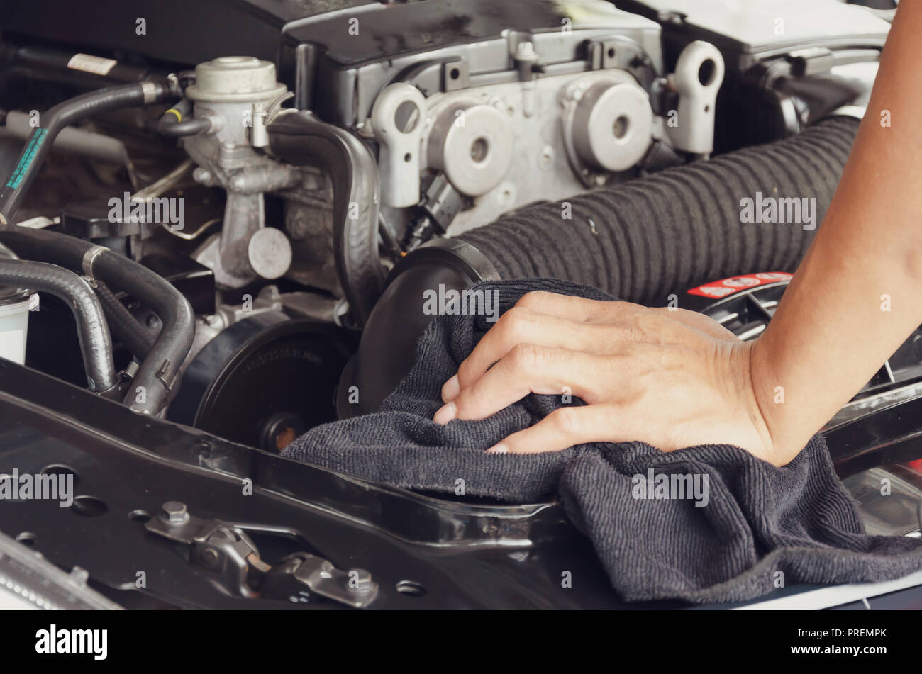 Men working engine check details Stock Photo - Alamy