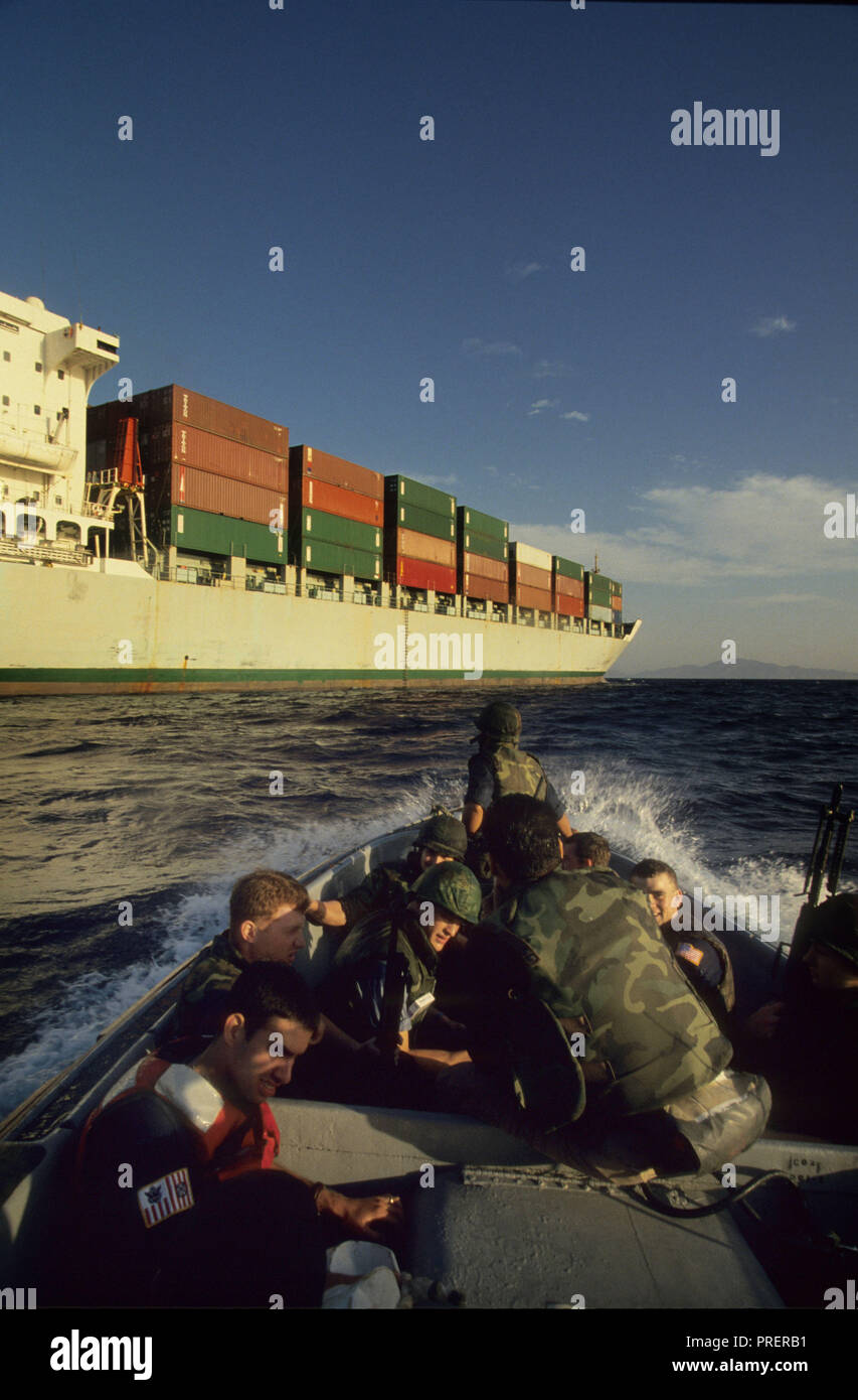 US Coast Guard patroling and boarding ships in the Red Sea to check for ...
