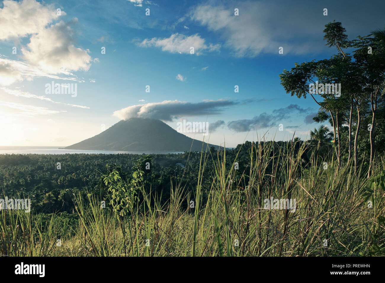 Manado Tua island and volcano view from Bunaken Island, Sulawesi ...
