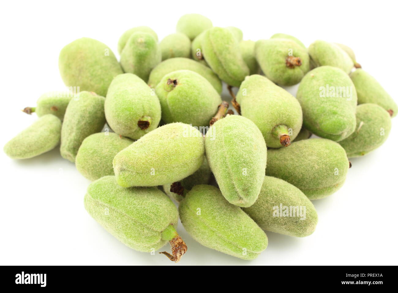 composition of fresh green almond fruits Stock Photo - Alamy