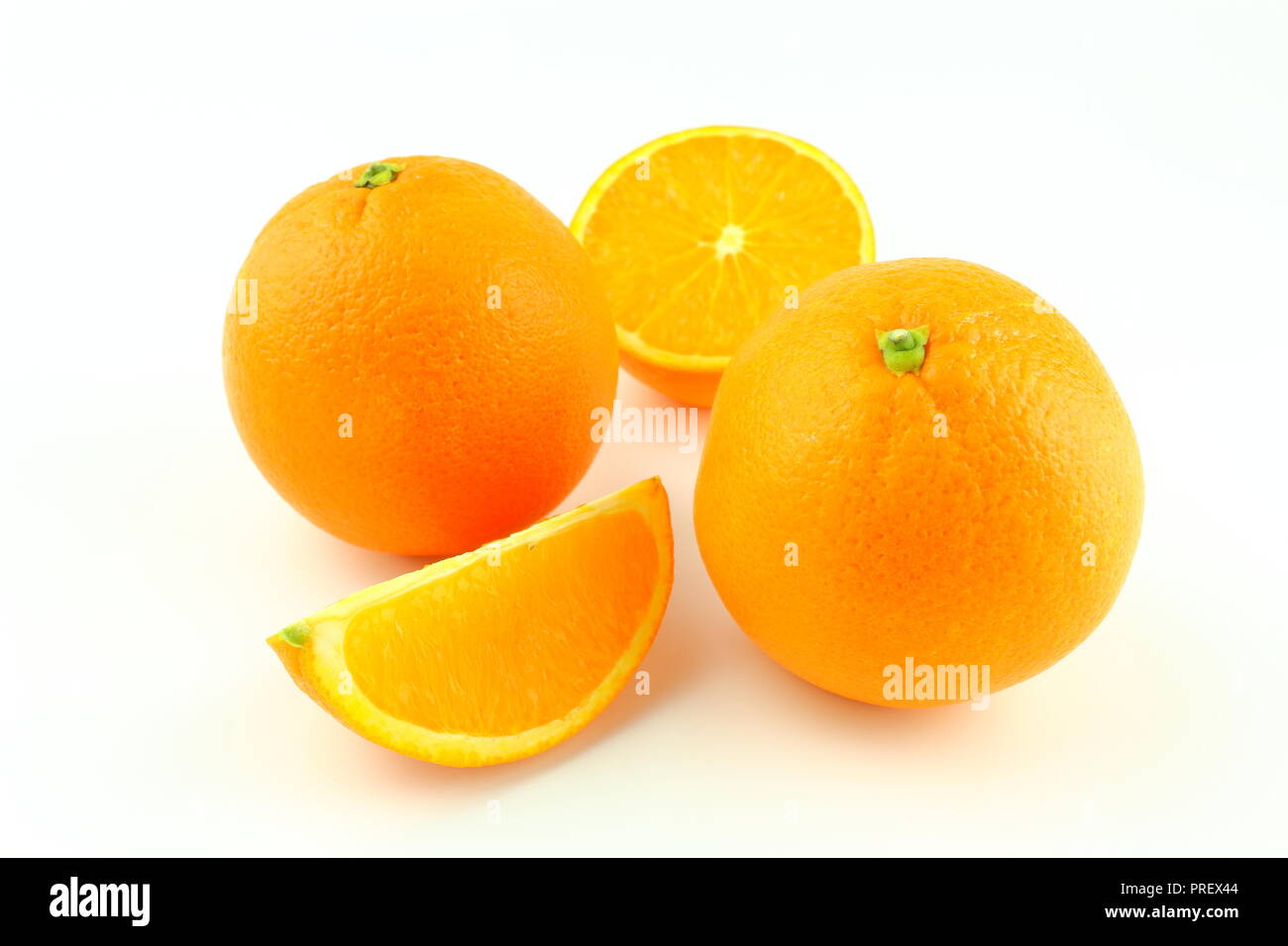 composition of fresh orange fruits isolated on a white background Stock ...