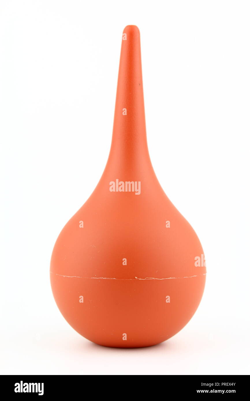 composition of a red ear syringe isolated on a white background Stock ...