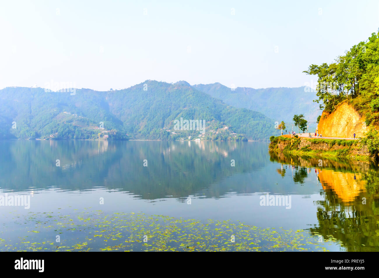 Photograph of autumn colourful lake, mountain, clear sky with ...