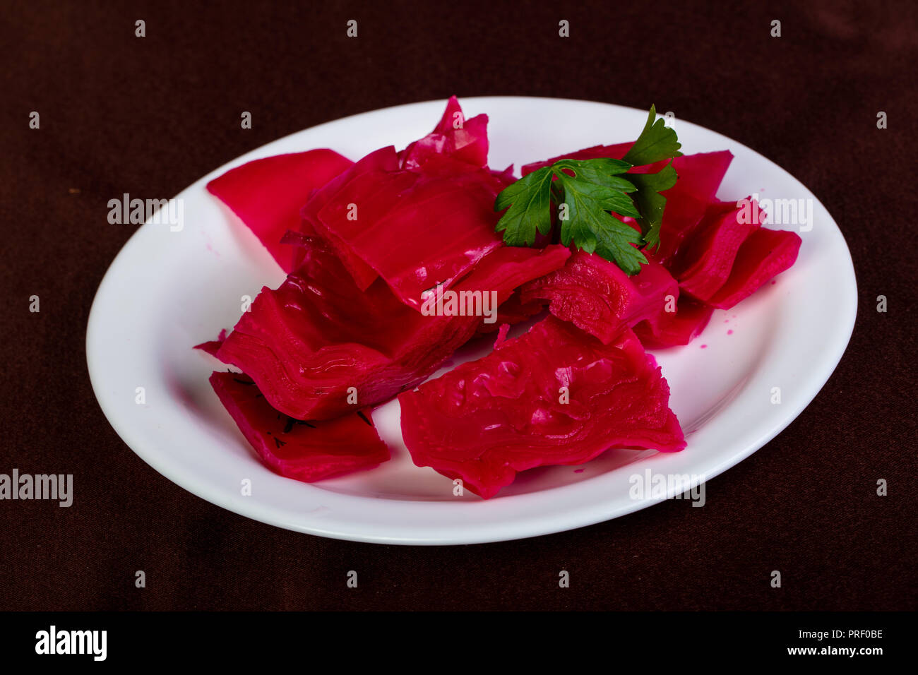 Pickled red cabbage in the plate Stock Photo - Alamy