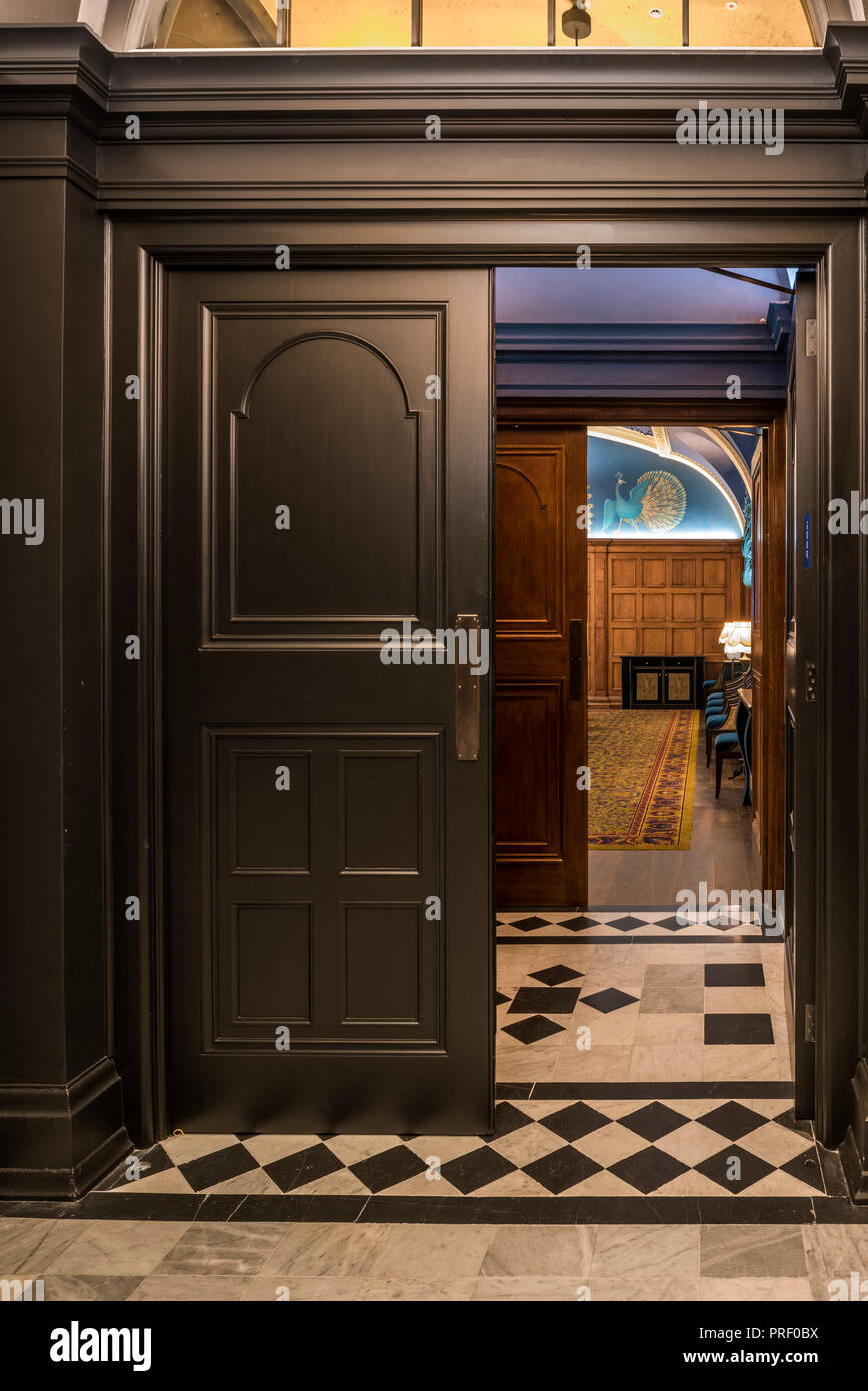 View through double doors to conference woom with Arts and Crafts ...