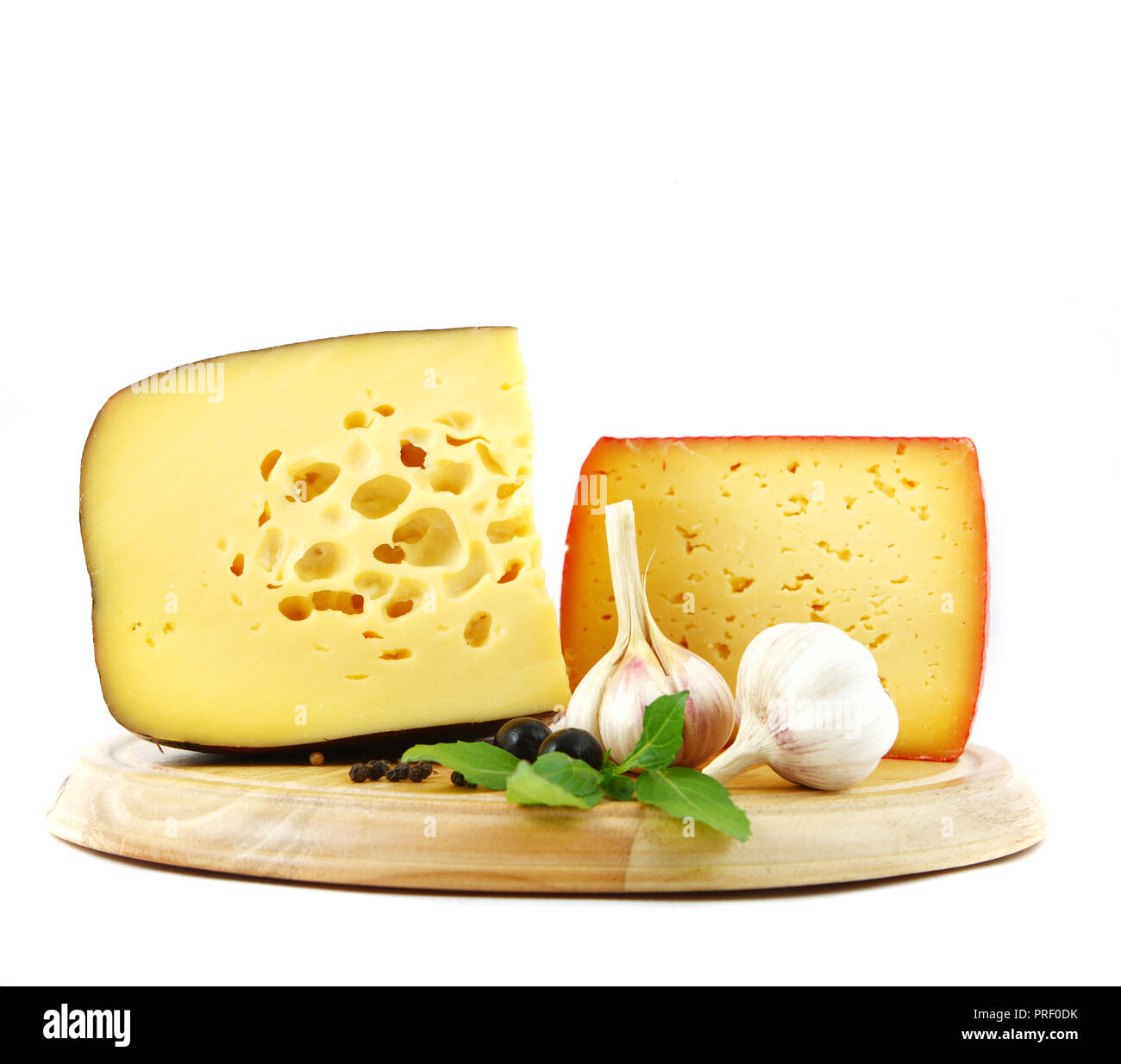 cheese on wooden board isolated on white for designing menu, cards, etc ...