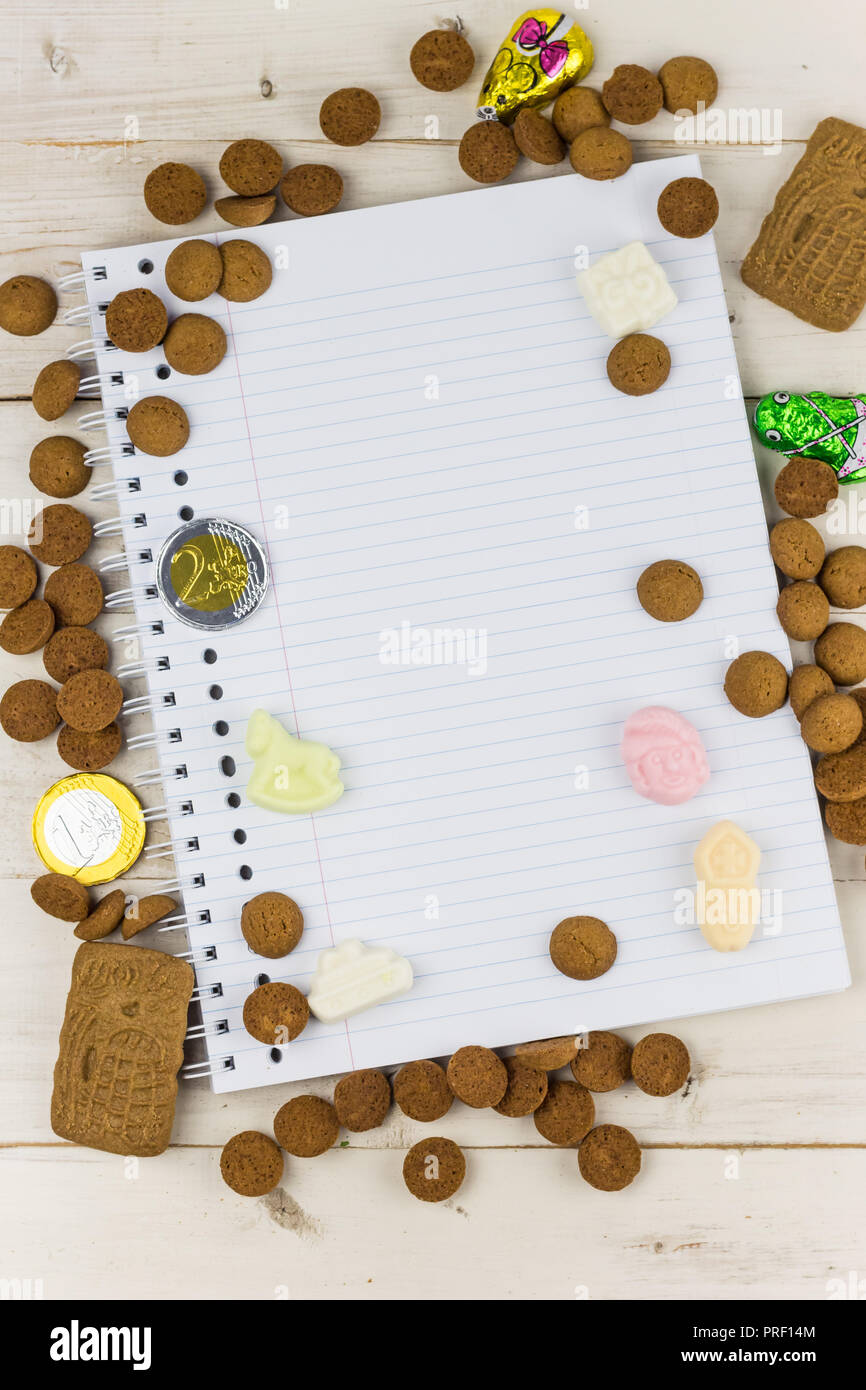 Notepad and traditional dutch candy for celebration of Sinterklaas ...