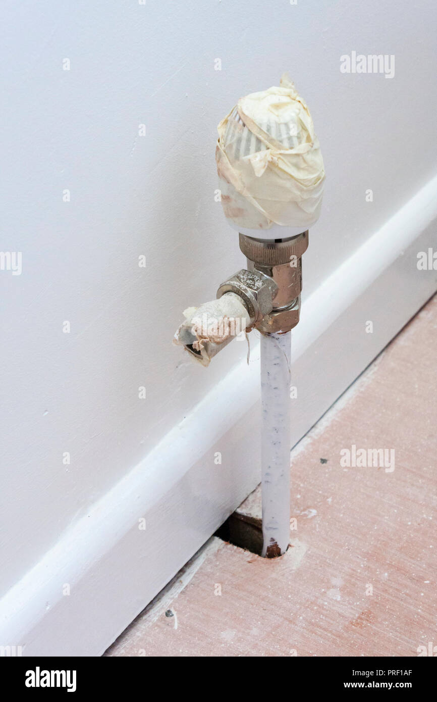Plumbed in pipework ready for radiator fitting installation Stock Photo ...