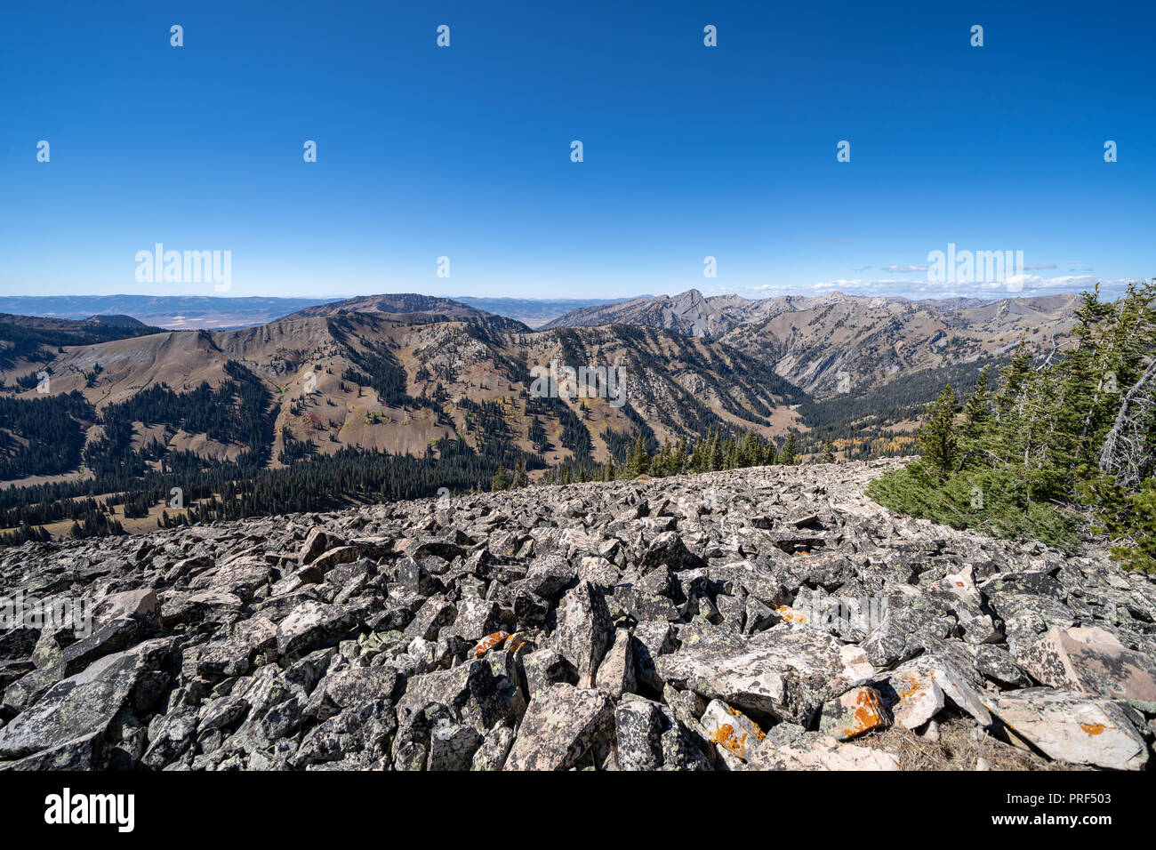 Rocky narrow dangerous ridge of talus scree rocks on top of mountains ...