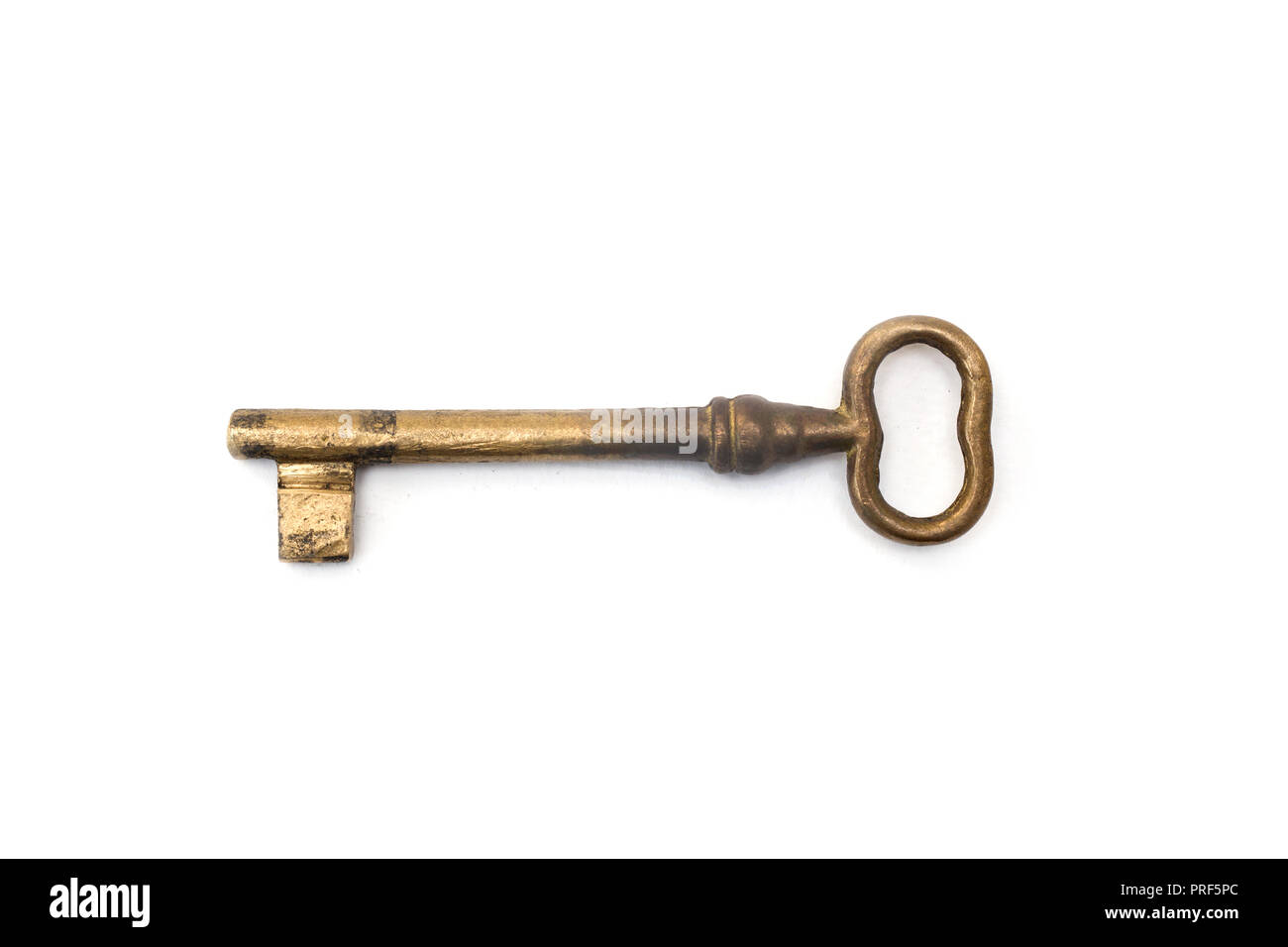 Old retro bronze door key isolated on white background Stock Photo - Alamy