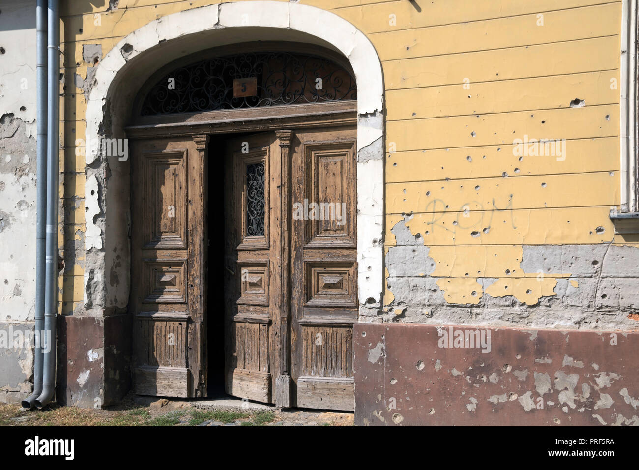 Bullet riddled wall hi-res stock photography and images - Alamy