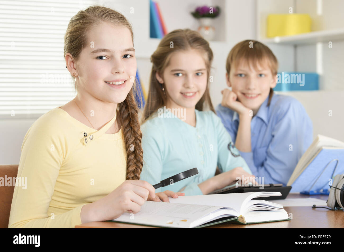 School girls doing their home work hi-res stock photography and images ...