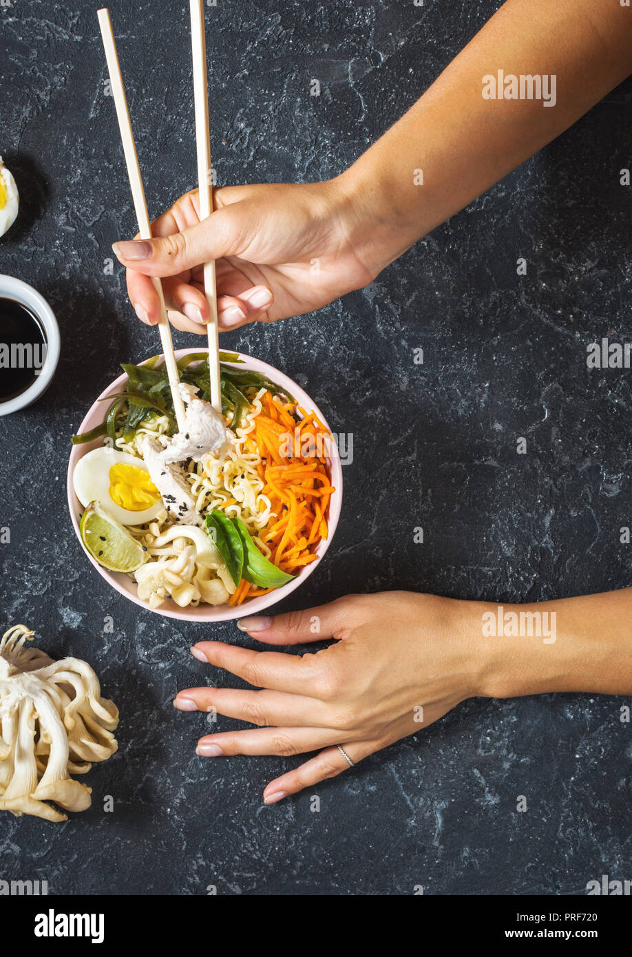 Ramen eat woman chopsticks bowl hi-res stock photography and images - Alamy