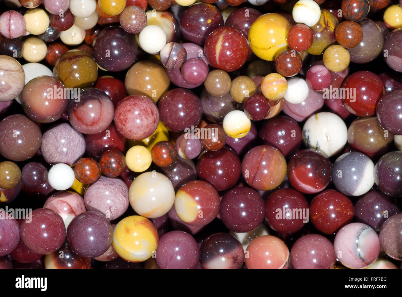 Texture, a mix of colored ball gemstones Stock Photo - Alamy