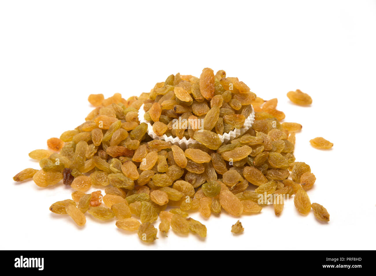 Dried raisins bowl over the white background Stock Photo - Alamy