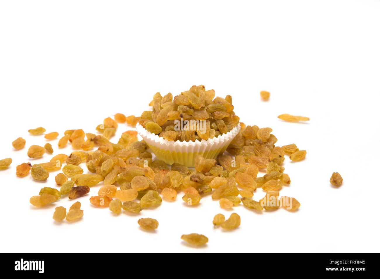 Dried raisin bowl over the white background Stock Photo - Alamy